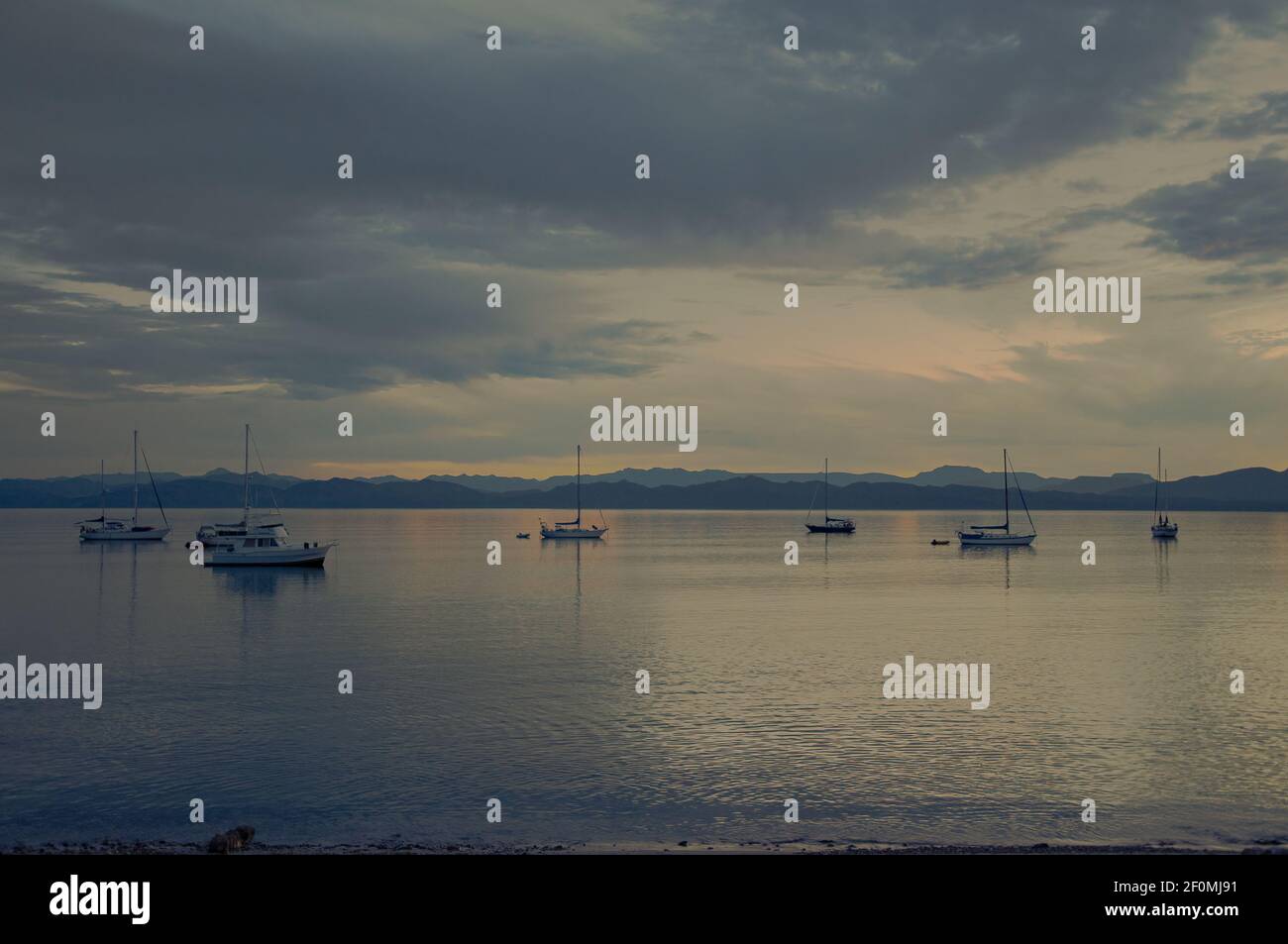Boats at anchor off of Punta Chivato, Baja California Sur, Mexico, on a ...