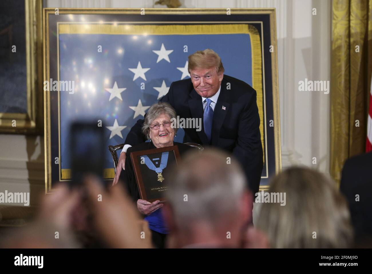President Donald Trump presents the Medal of Honor to Pauline Connor ...