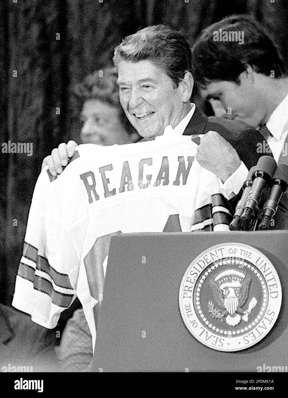 President Ronald Reagan responds to cheering suppporters after being ...