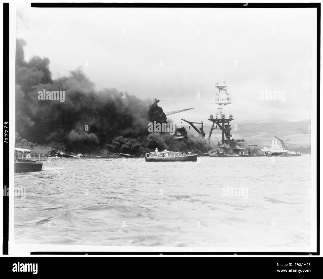 USS Arizona, at height of fire, following Japanese aerial attack on ...