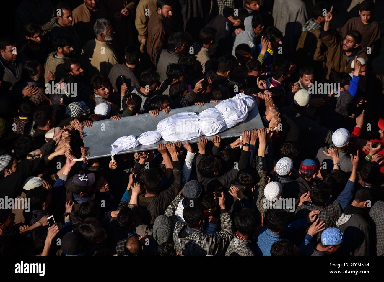 Kashmiri villagers are seen carrying dead body of Slain Atif Shafi ...