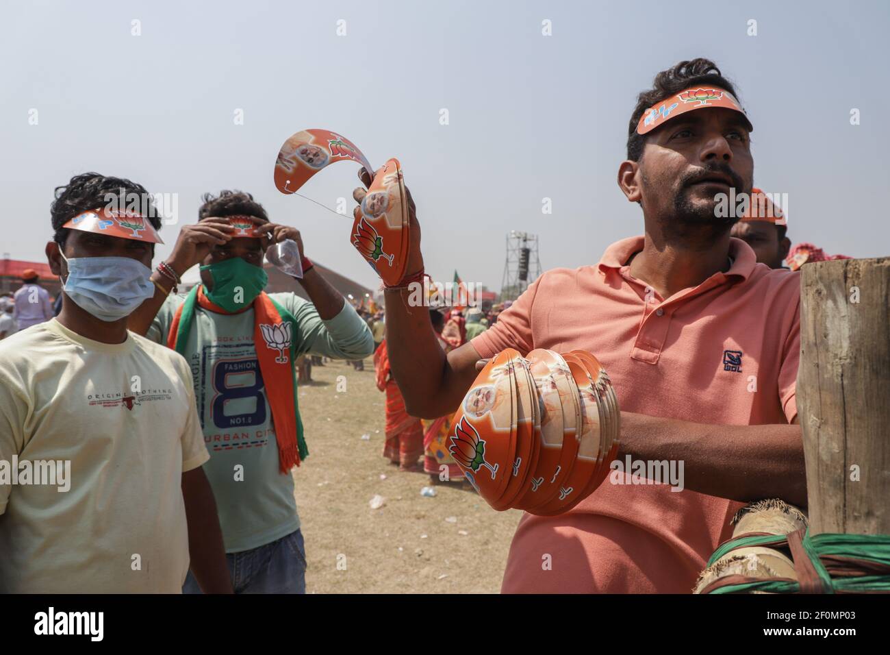 A man sells BJP's (Bhartiya Janta Party) symbol printed caps during the ...