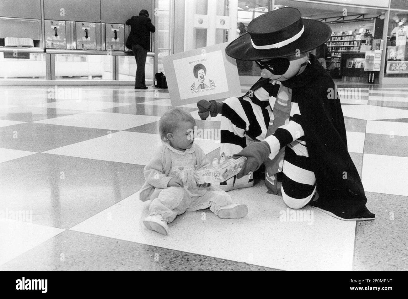 The McDonald's Hamburglar hands a children's Happy Meal to 1-year-old ...