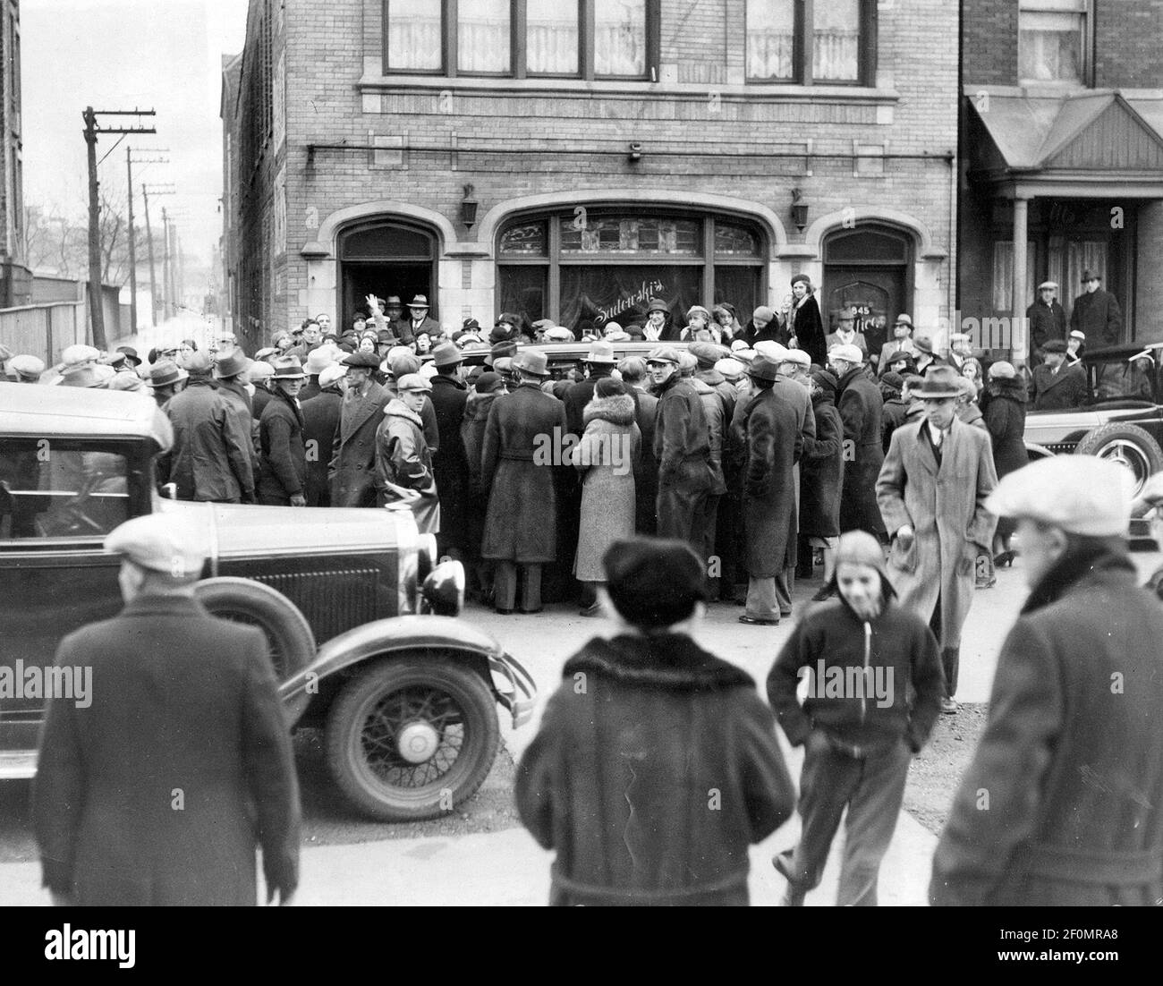 A crowd gathers in front of Sadowski Funeral home at 1845 N. Hermitage ...