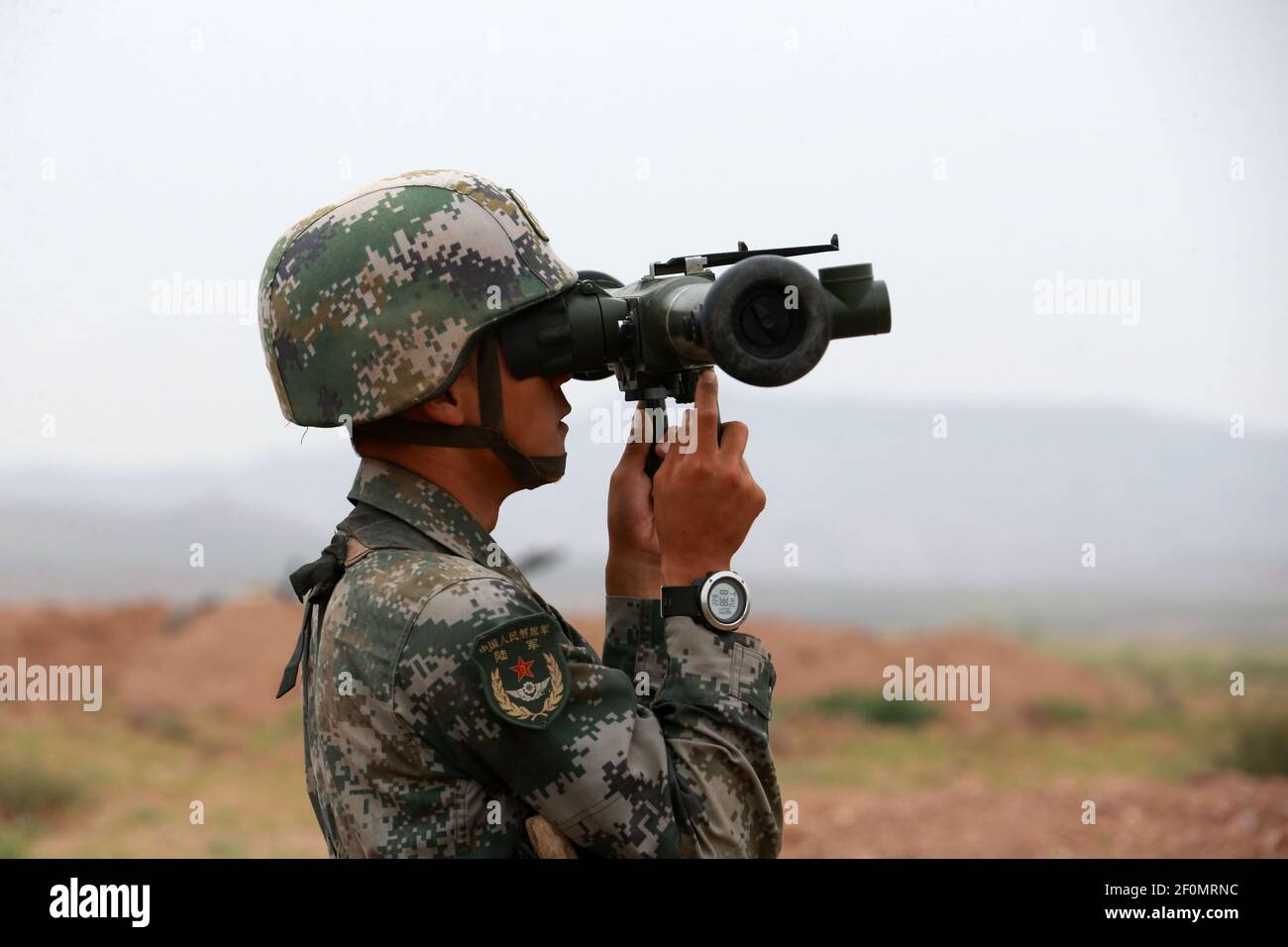 In this undated photo, Chinese soldiers of the PLA 76th Group Army take ...