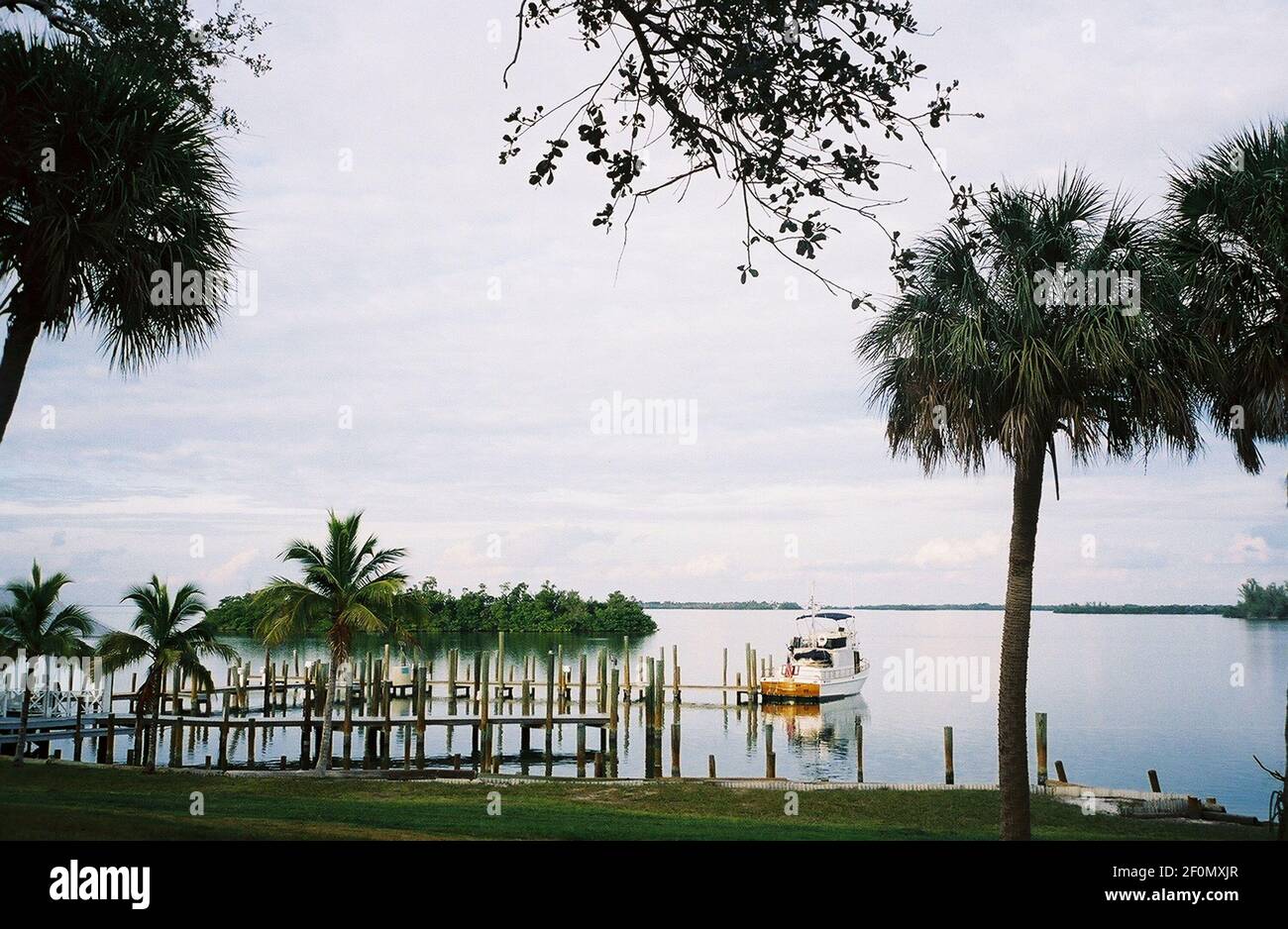 A fishing boat heads out from Cabbage Key, Fla. to test the waters in ...