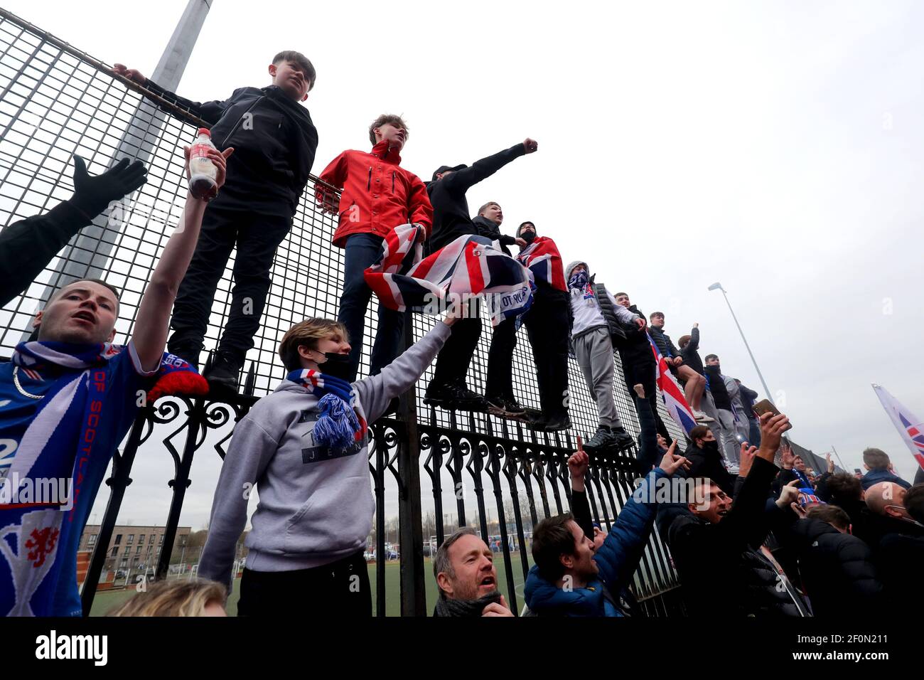 Rangers fans celebrate outside of the Ibrox Stadium after Rangers win ...