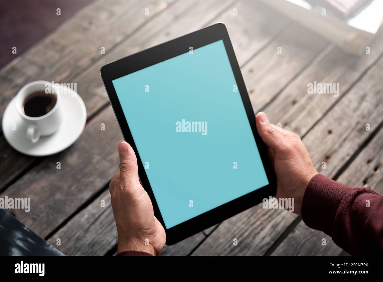 Digital tablet in male hands Stock Photo - Alamy