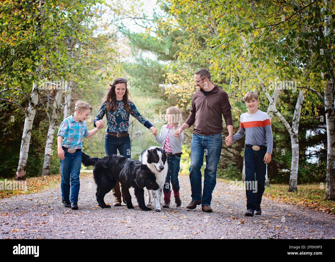 Child walking down rural road hi-res stock photography and images - Alamy