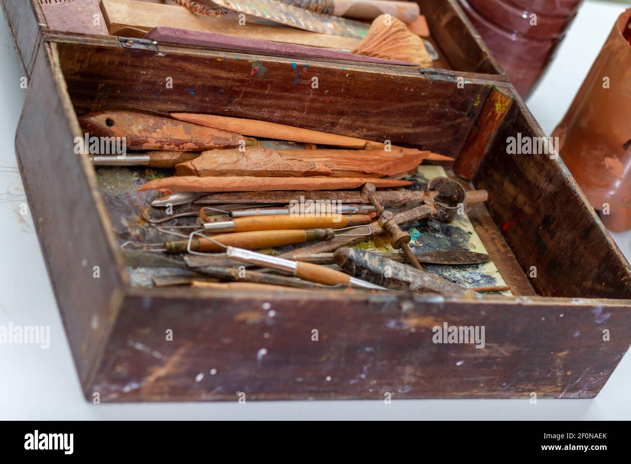 Art concept. Instruments used to model sculpture. Box with various ...