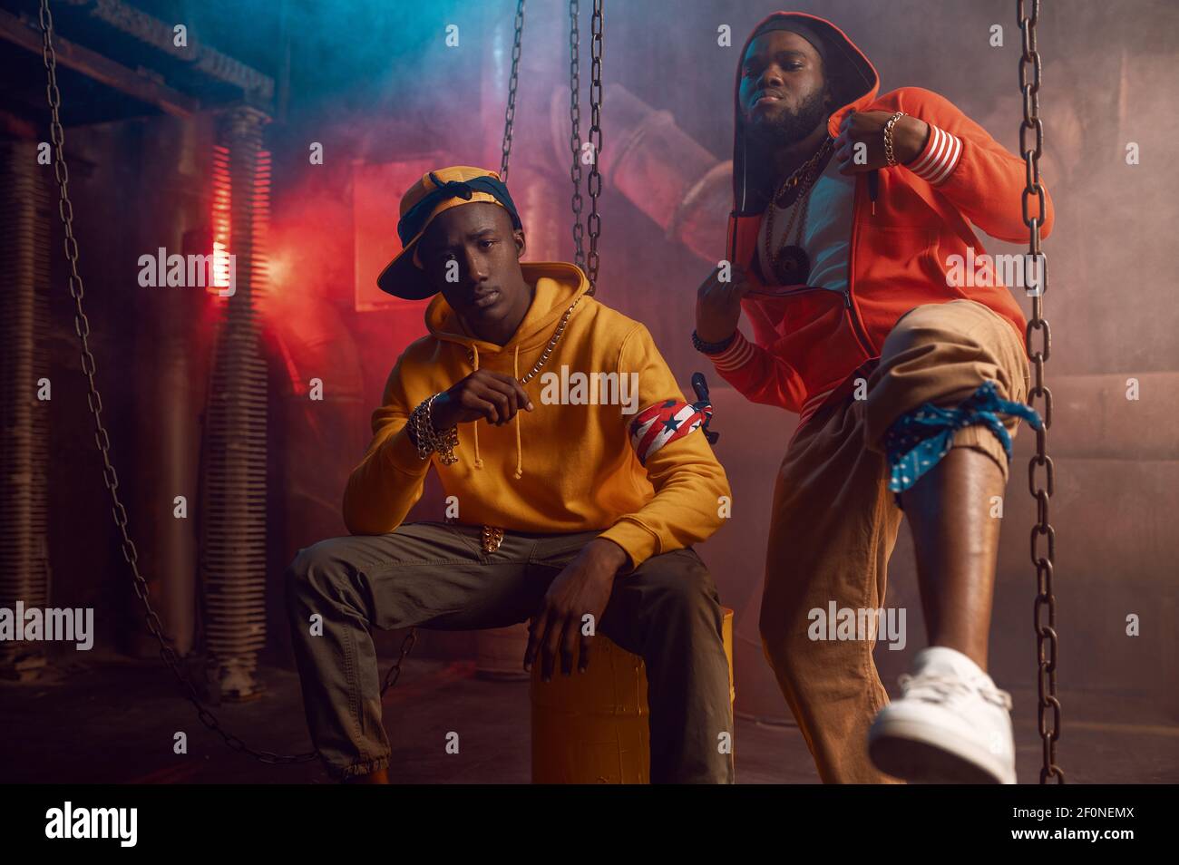 Two stylish rappers dancing in studio Stock Photo - Alamy