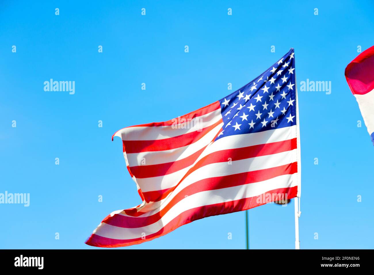 World waving flag in the blue sky colour and street lamp Stock Photo ...