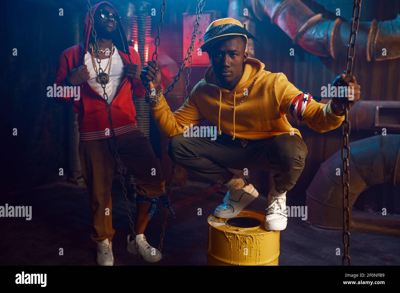Two stylish rappers dancing in studio Stock Photo - Alamy