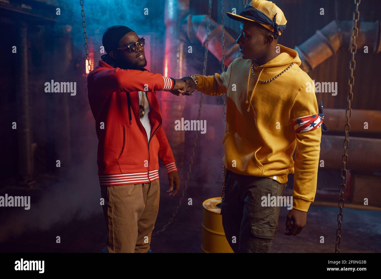 Two stylish rappers, breakdancing in studio Stock Photo - Alamy