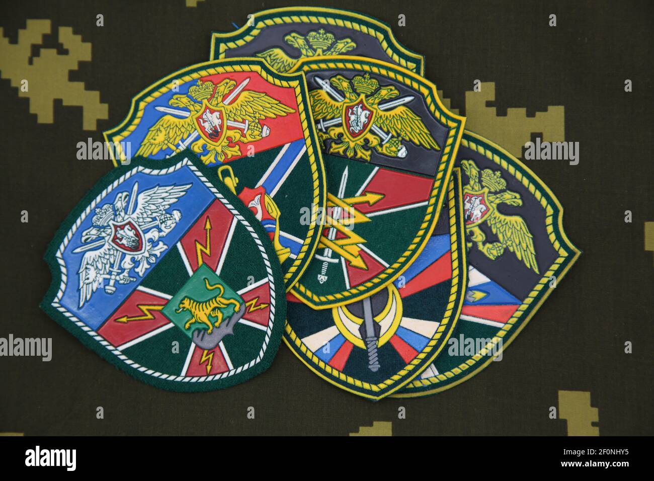 Russian border troops patches on camo background Stock Photo - Alamy