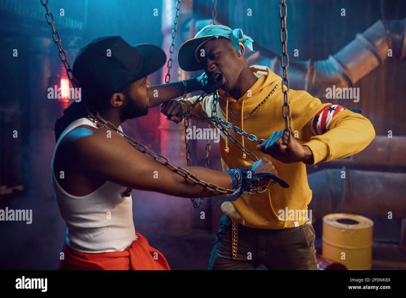 Two rappers posing, performing in studio Stock Photo - Alamy