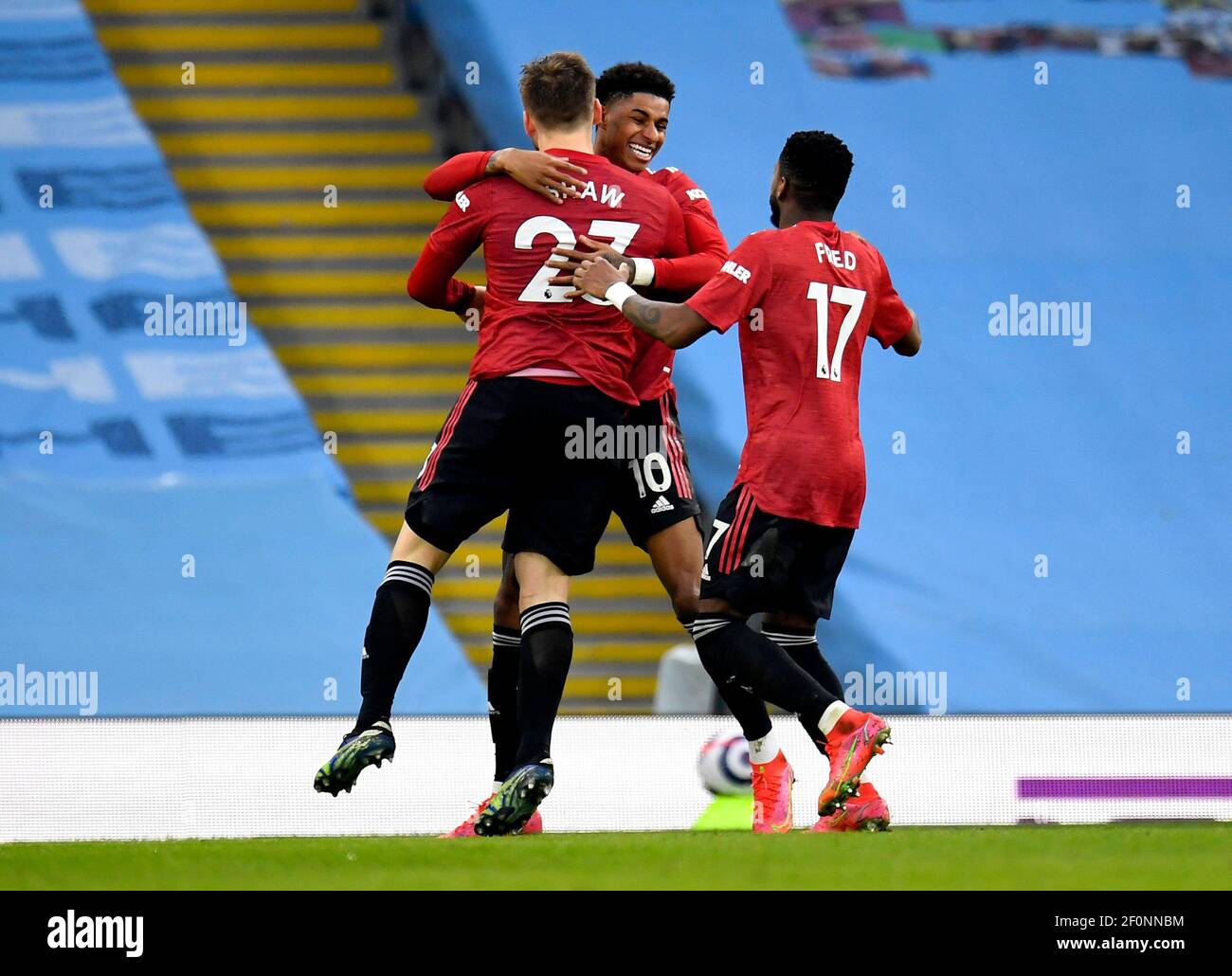 Manchester United's Luke Shaw (left) celebrates scoring their side's ...