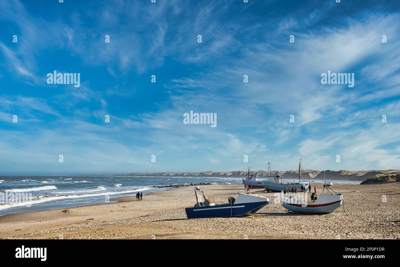 Coastal fishing boats vessels at Vorupoer beach in Western Denmark ...