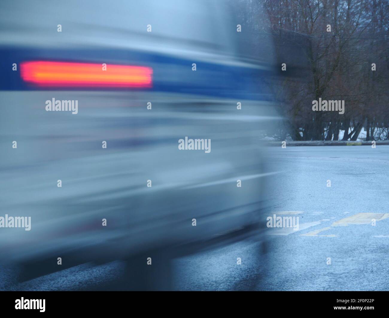 Police vehicle passing emergency lights hi-res stock photography and images - Alamy