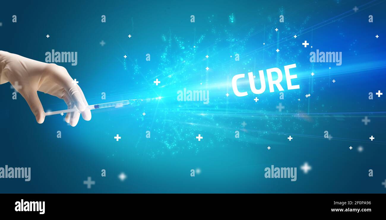 Syringe, medical injection in hand with CURE inscription, medical ...