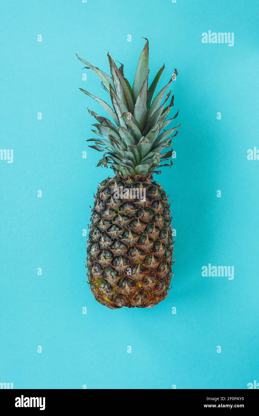 Pineapple blue background hi-res stock photography and images - Alamy
