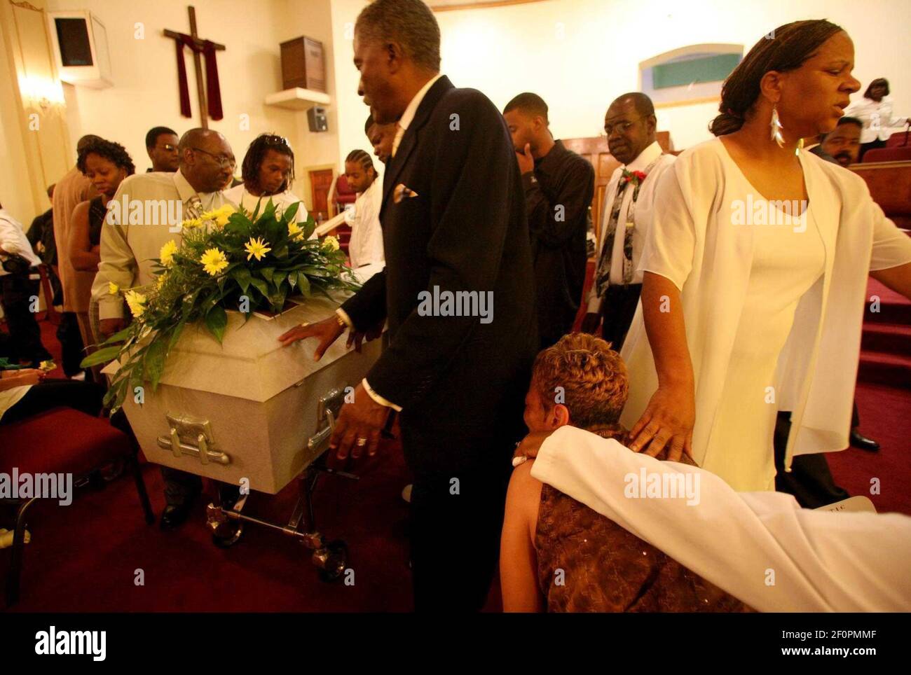 4 August 2006 - New Orleans, Louisiana - Friends and relatives of three ...