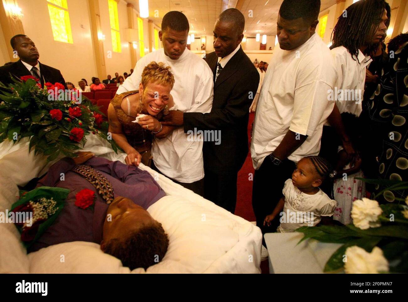 4 August 2006 - New Orleans, Louisiana - Friends and relatives of three ...