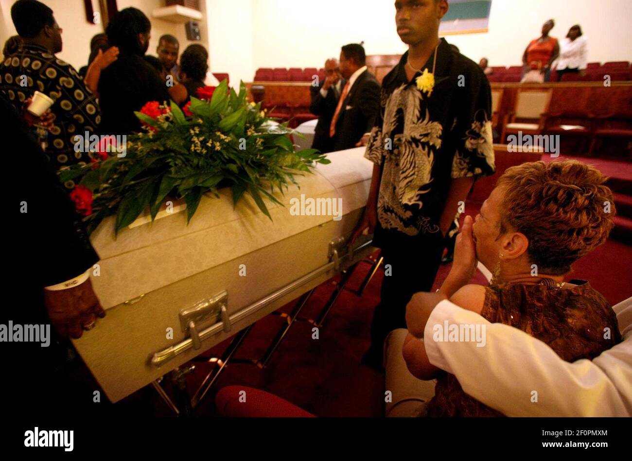 4 August 2006 - New Orleans, Louisiana - Friends and relatives of three ...