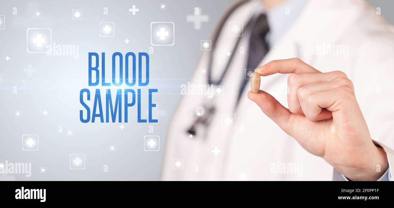 Vitamin doctor showing blood sample hi-res stock photography and images ...