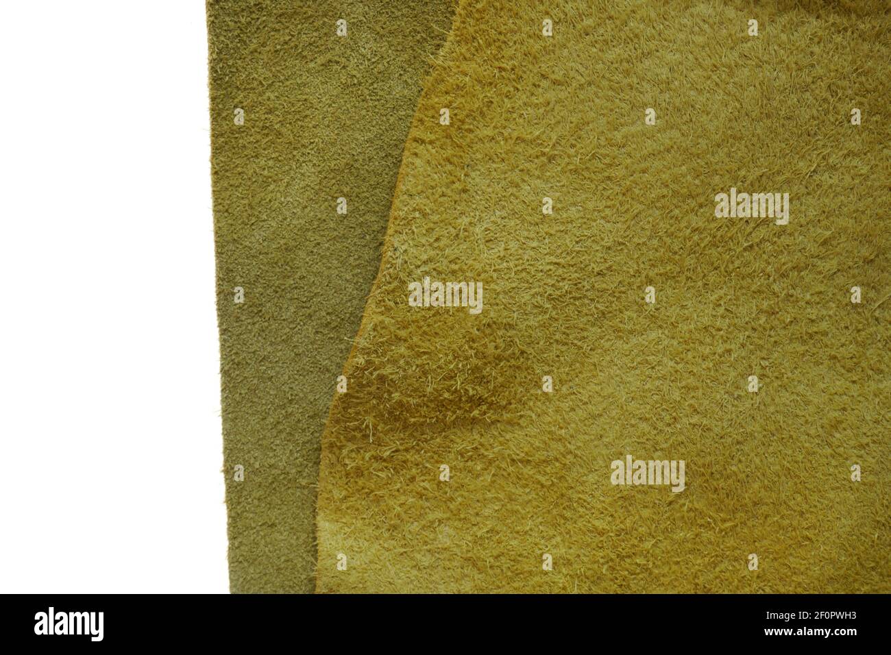 Genuine leather piece isolated on white background.Yellow genuine ...