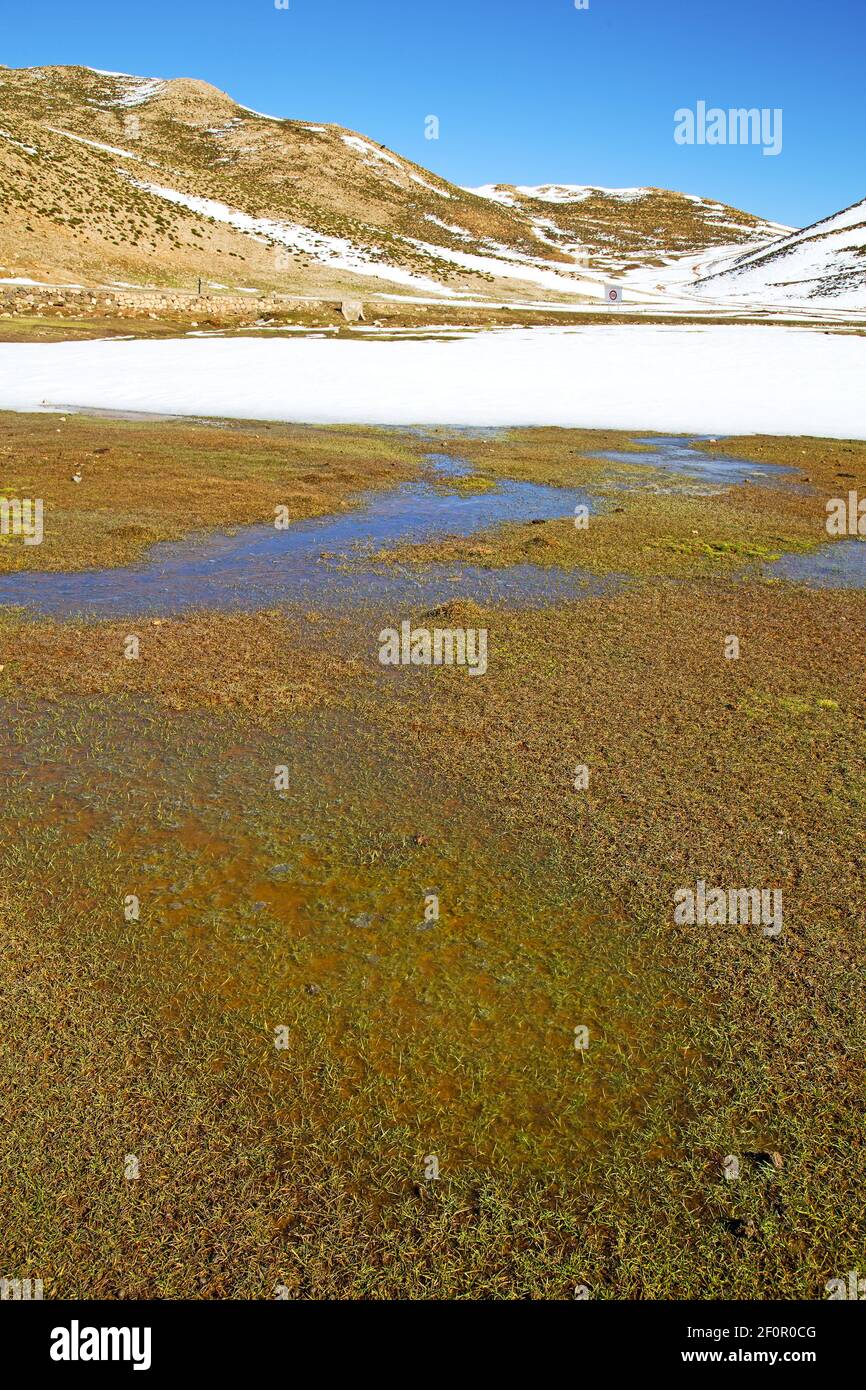 Hill in africa morocco water river lake pond isolated Stock Photo - Alamy