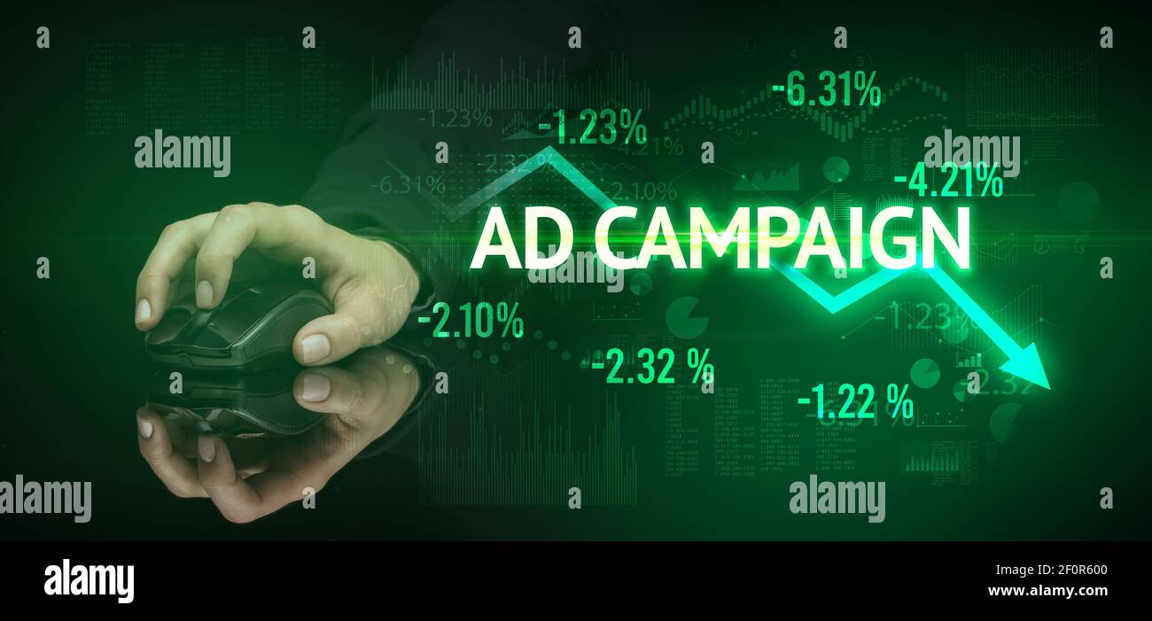 male hand holding wireless peripheral with AD CAMPAIGN inscription ...