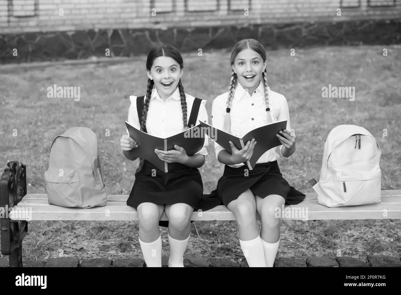 School girl in uniform using Black and White Stock Photos & Images - Alamy