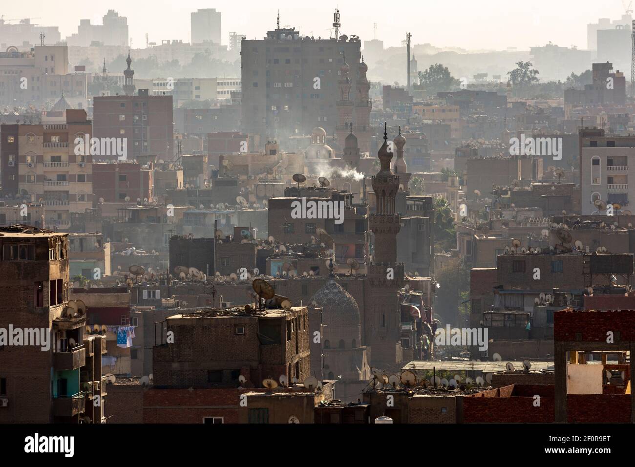 Cairo cityscape in the smog with minarets as seen from viewing platform ...