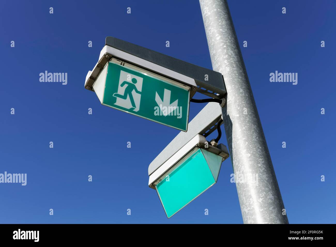 Escape route, emergency exit, sign in front of blue sky, Duesseldorf ...