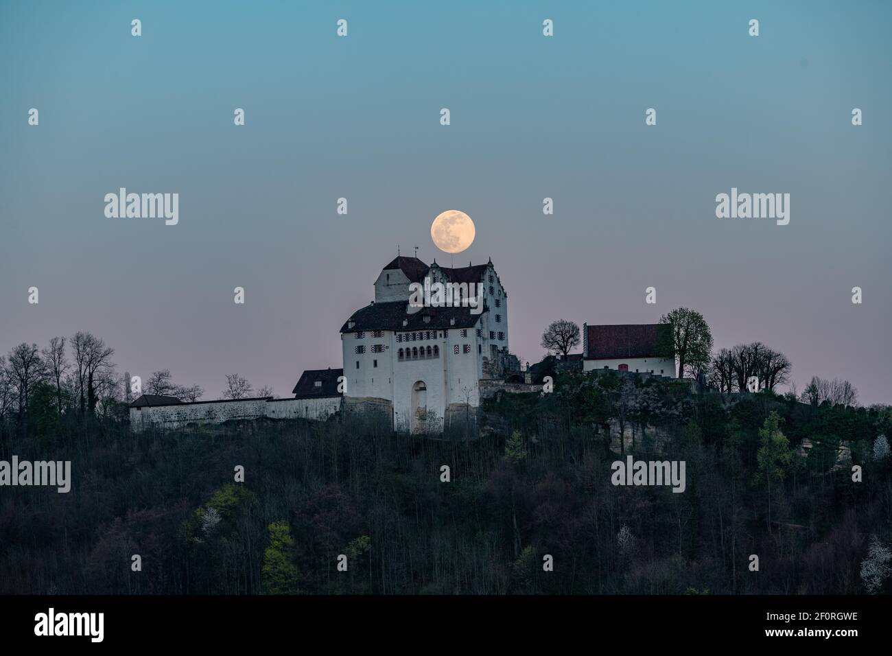 Wildegg Castle with moonrise, Canton Aargau, Switzerland Stock Photo ...