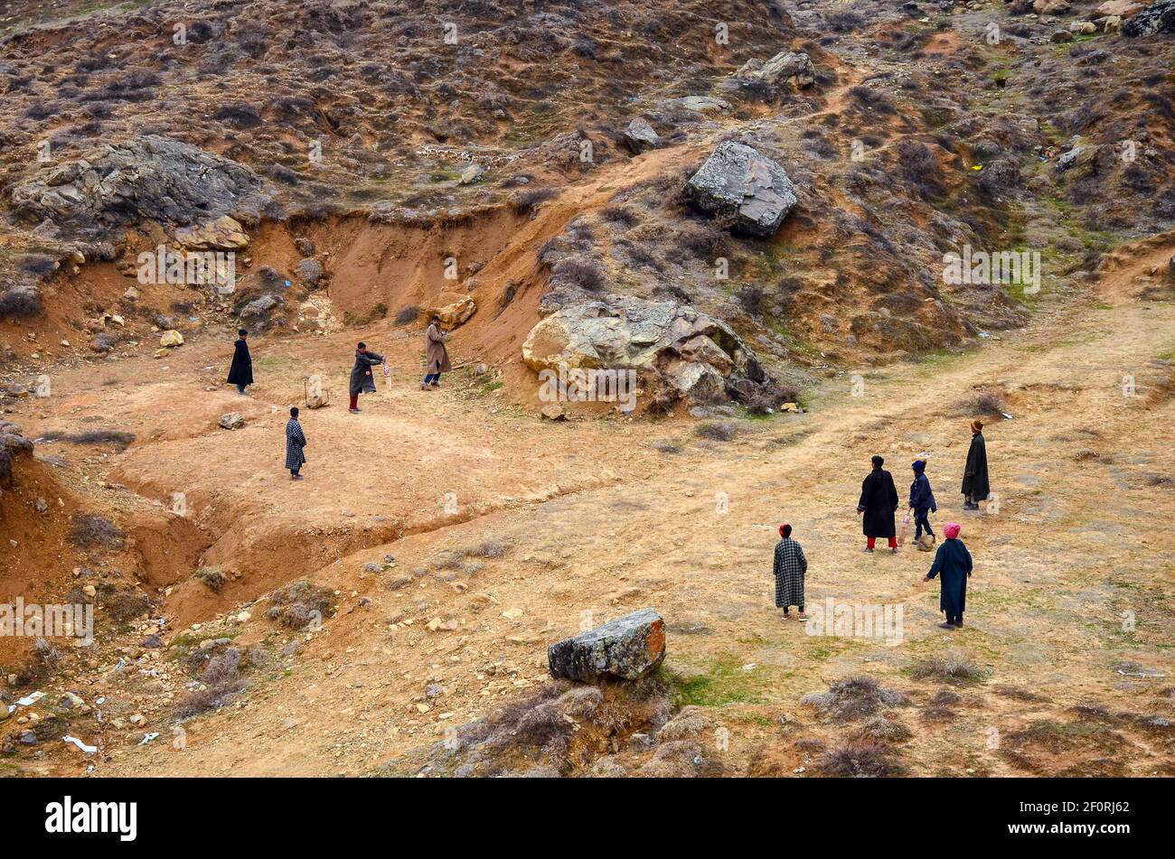 Kashmiri nomadic children play cricket on the outskirts of Srinagar ...