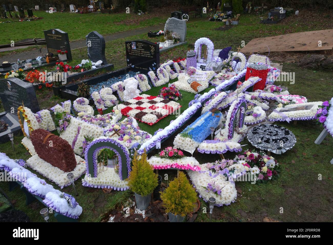 Floral tribute of wreaths at Gypsy graveside cemetery Britain, Uk 2021 ...