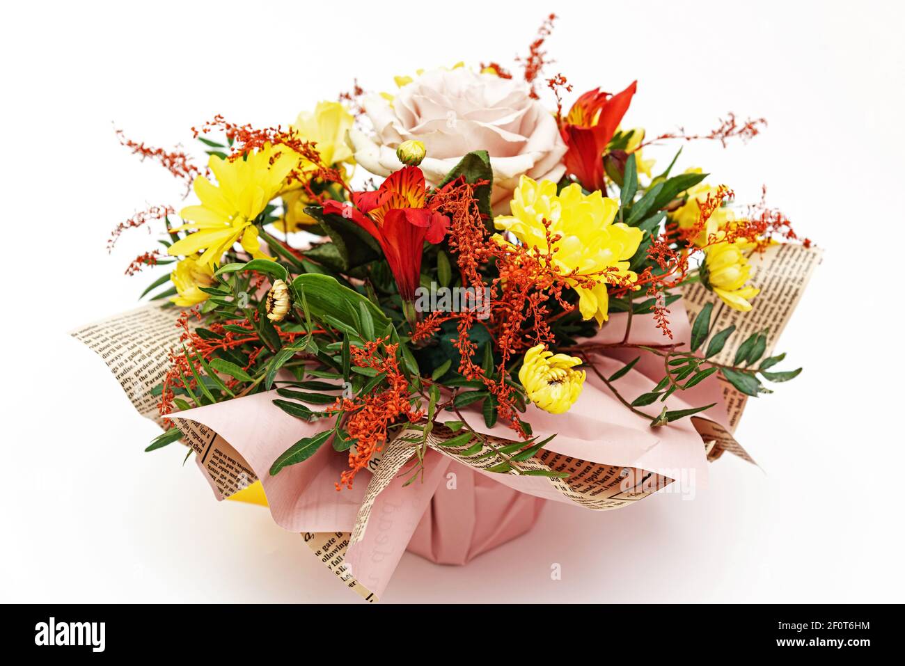 Floral arrangement, yellow chrysanthemum and pink rose in flower ...