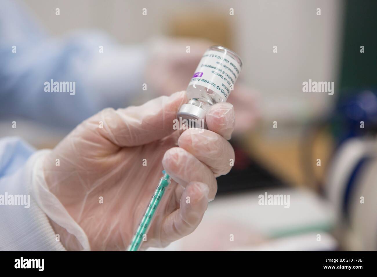 Covid-19 vaccination, vaccine from AstraZeneca, ampoule syringe being ...