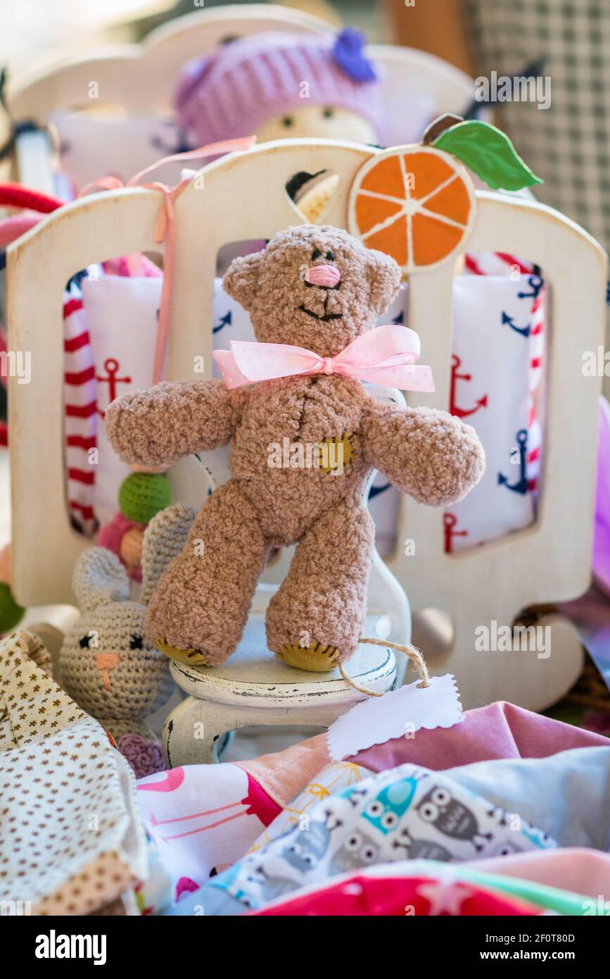 Toy bear on white wooden stool Stock Photo - Alamy