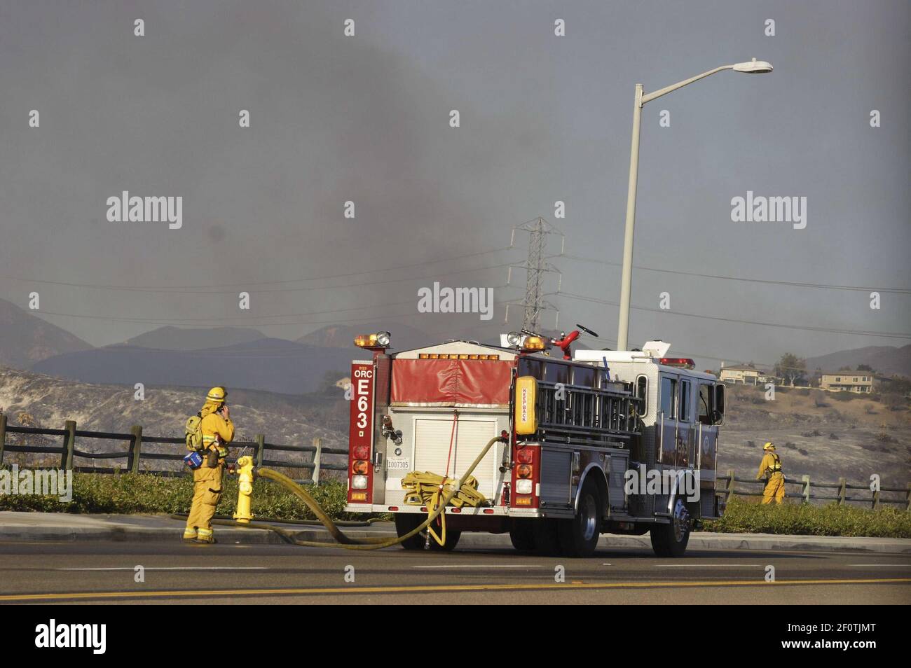 23 October 2007 - Foothill Ranch, CA -Fire Crews monitor the Santiago ...