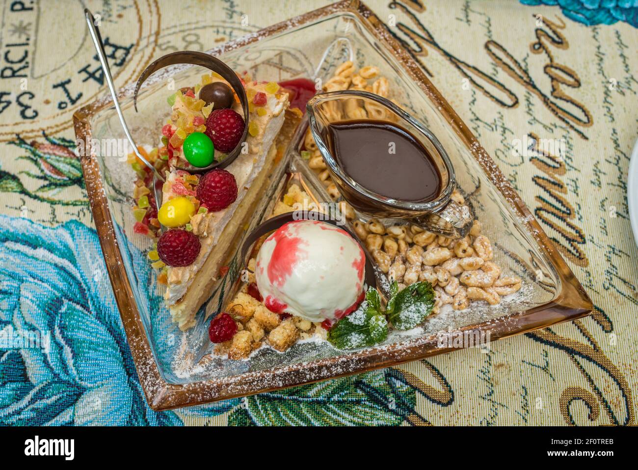 Ice cream, raspberries and melted chocolate Stock Photo - Alamy
