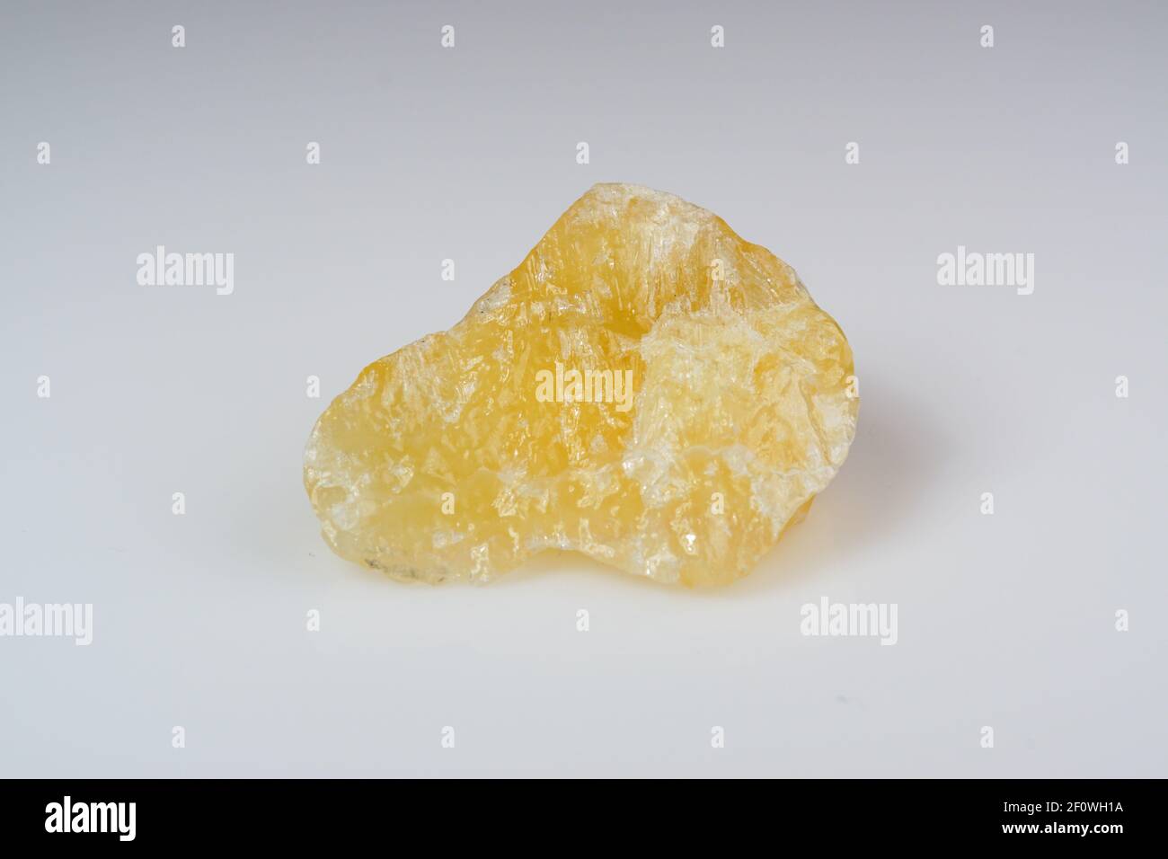 Natural mineral calcite on a white background Stock Photo - Alamy