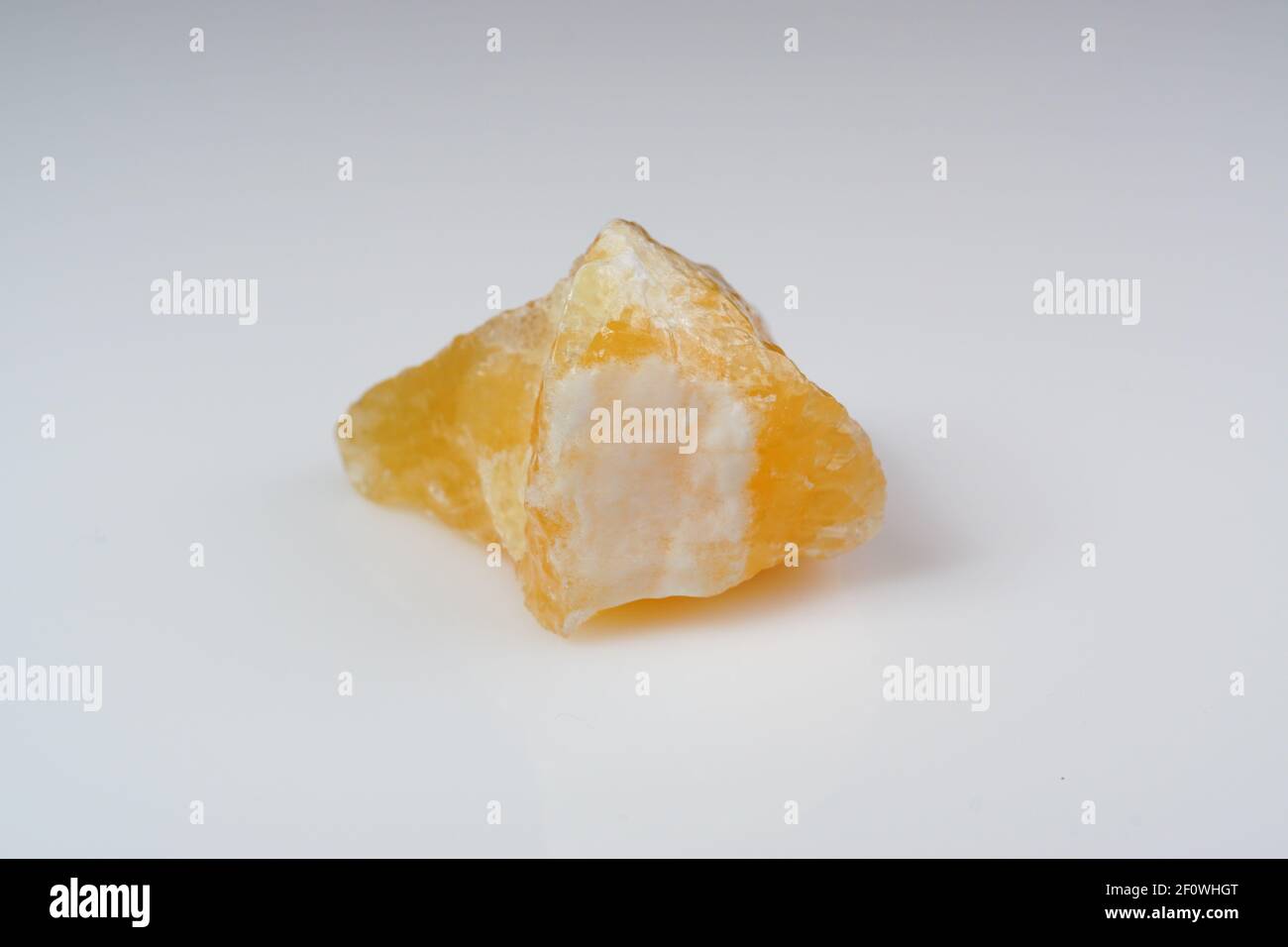 Natural mineral calcite on a white background Stock Photo - Alamy