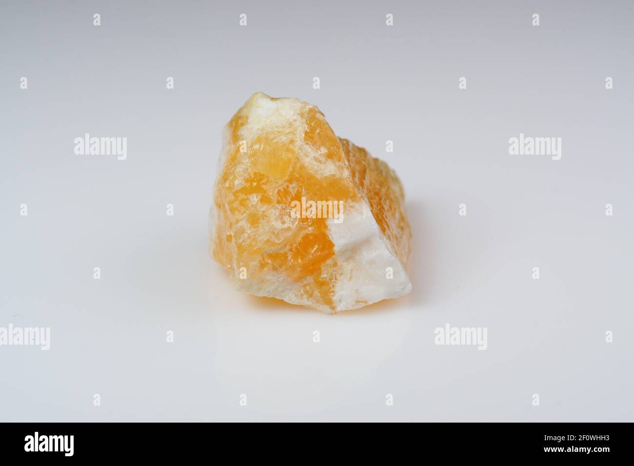 Natural mineral calcite on a white background Stock Photo - Alamy