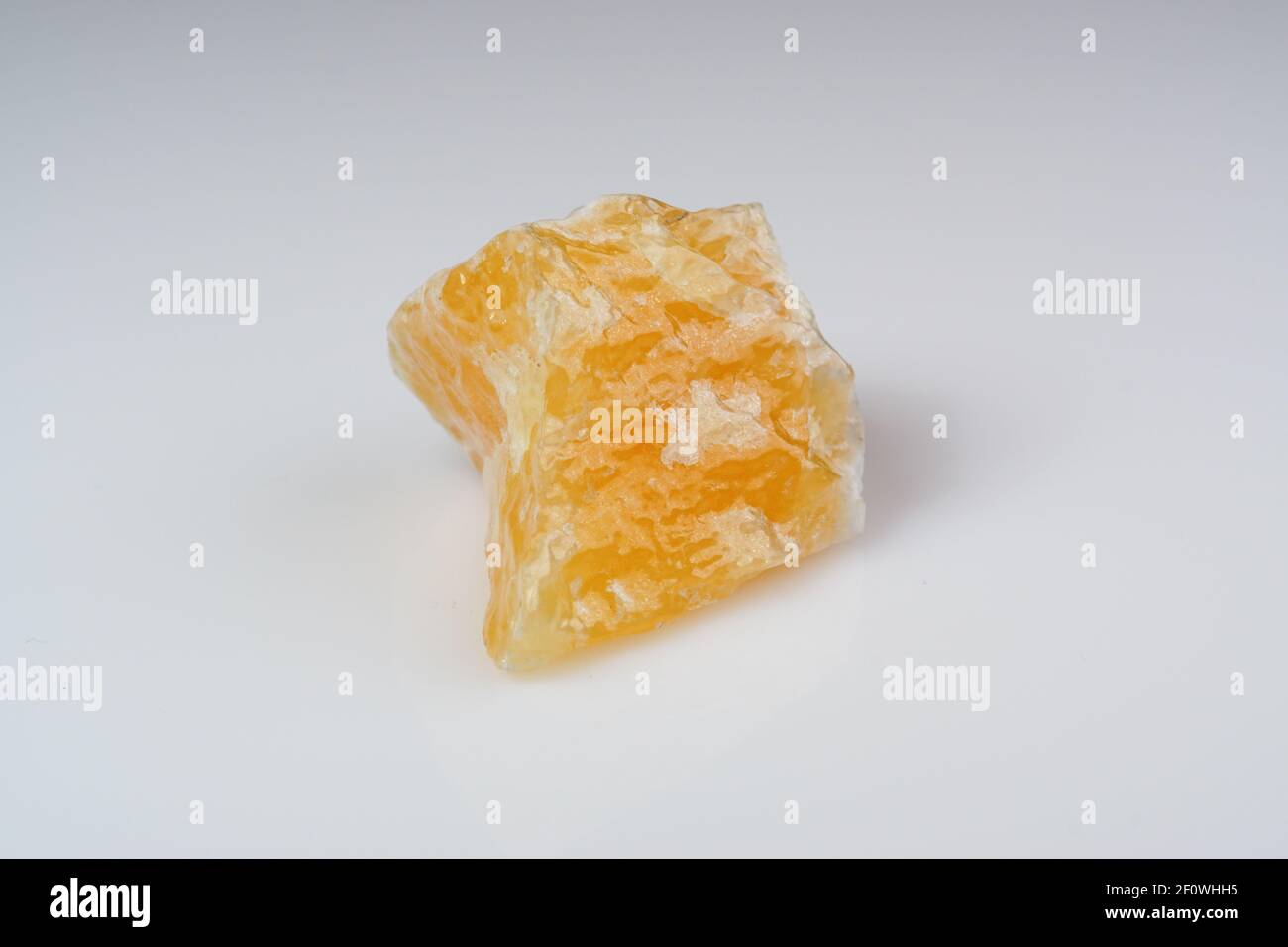 Natural mineral calcite on a white background Stock Photo - Alamy