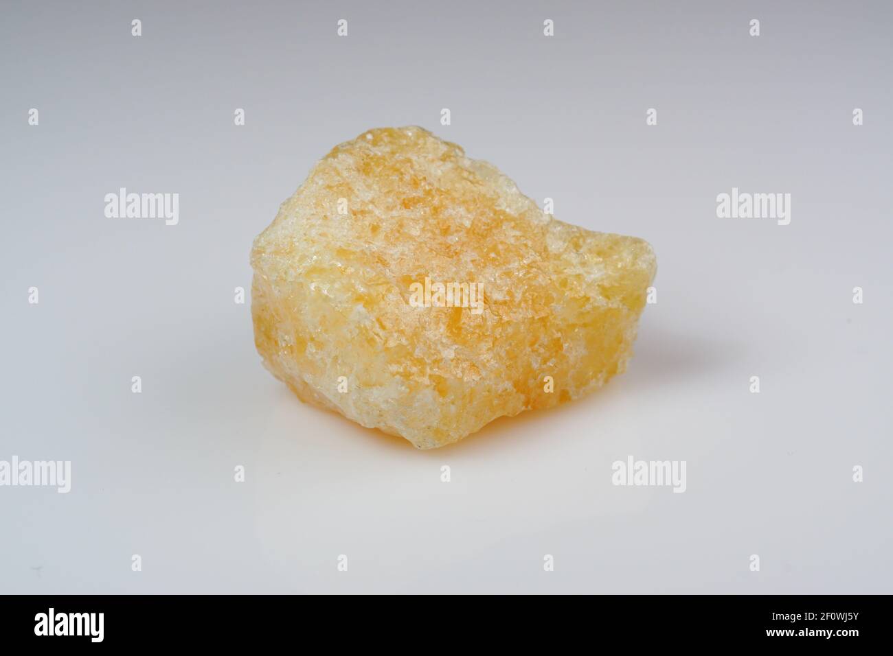 Natural mineral calcite on a white background Stock Photo - Alamy