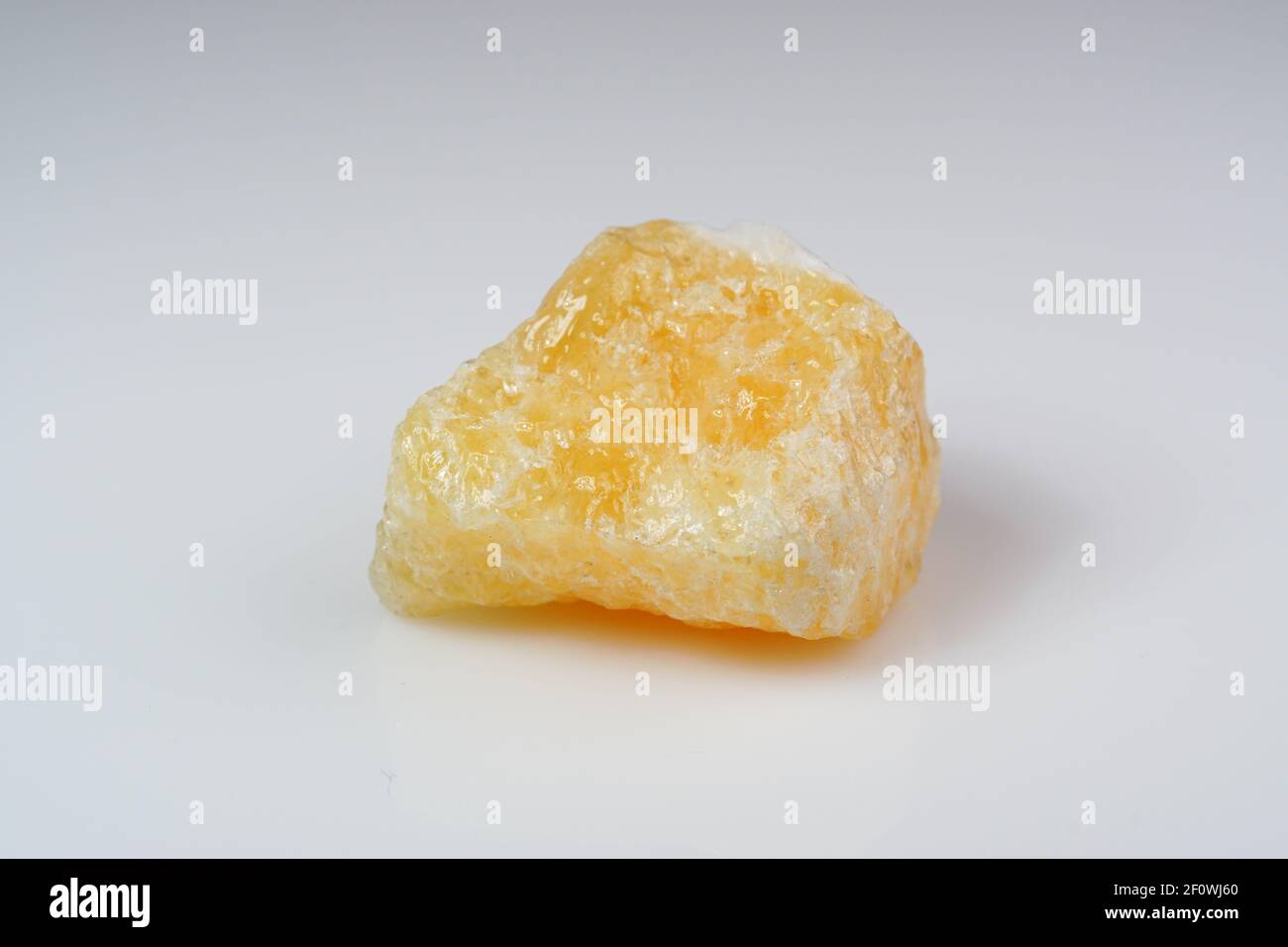 Natural mineral calcite on a white background Stock Photo - Alamy