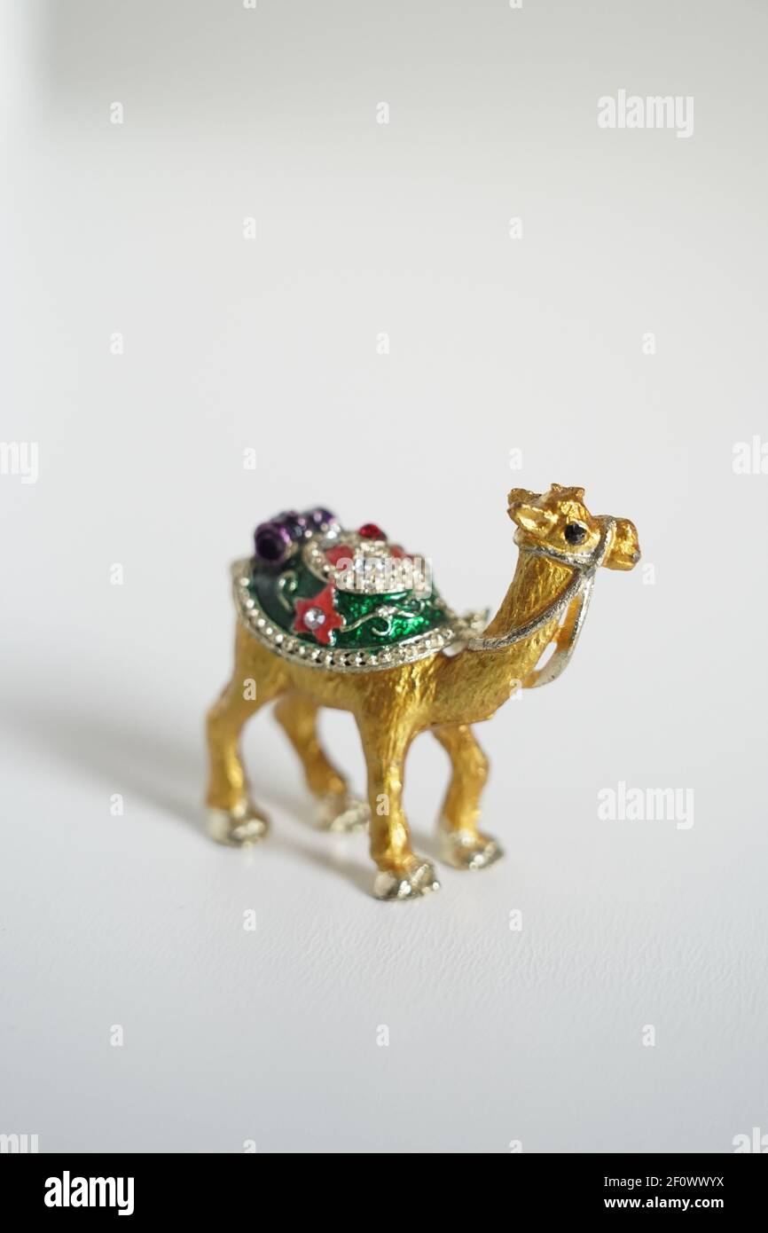 tiny camel figurine Stock Photo - Alamy